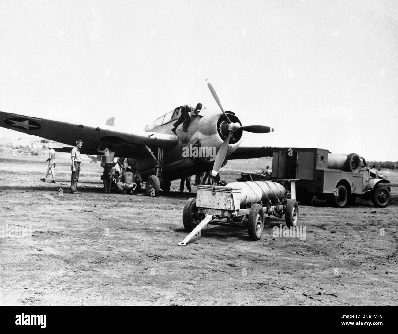 A destruction dealing torpedo awaits loading aboard a Navy torpedo ...