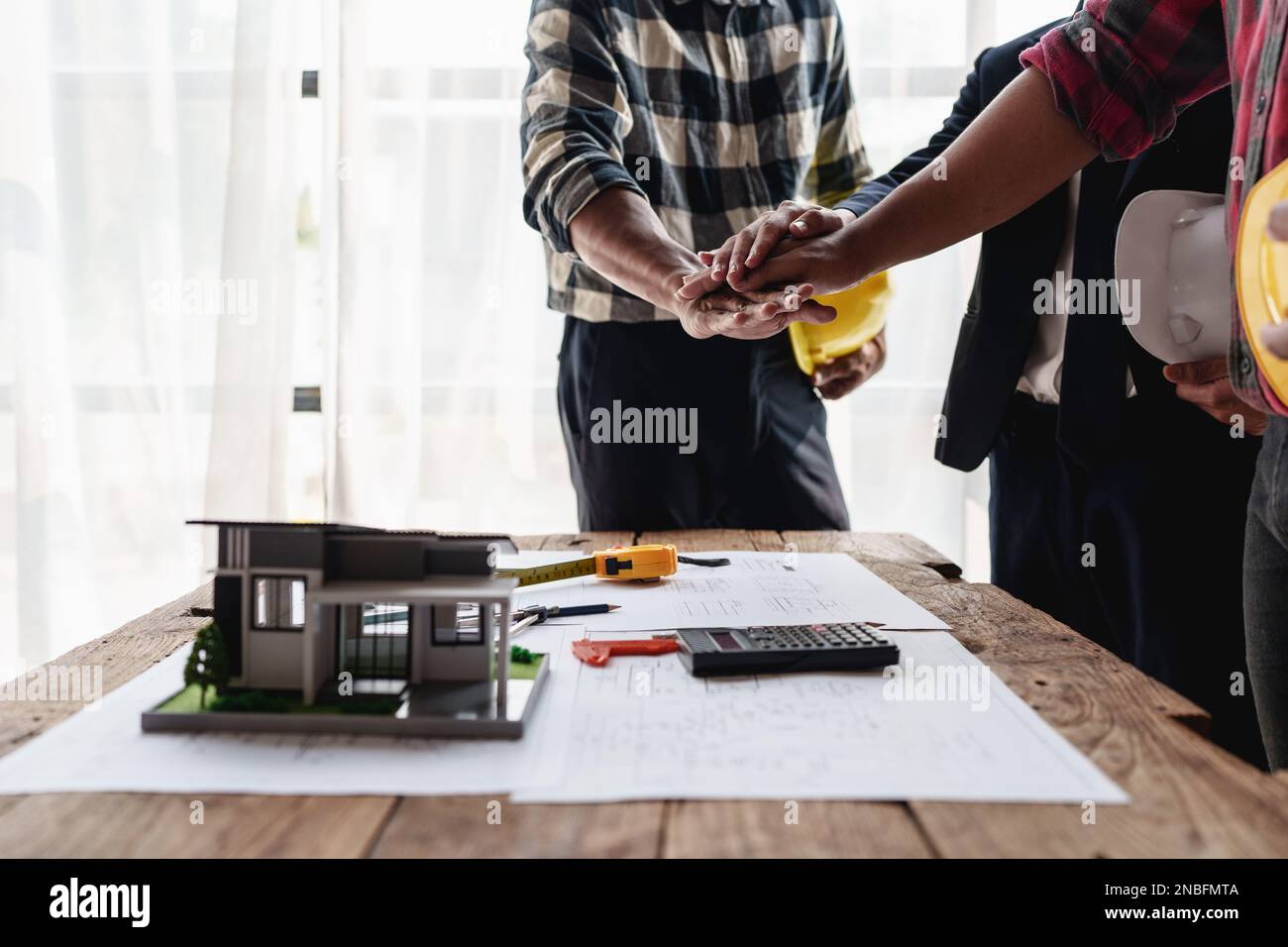 Group of professional engineering people brainstorming at meeting and ...