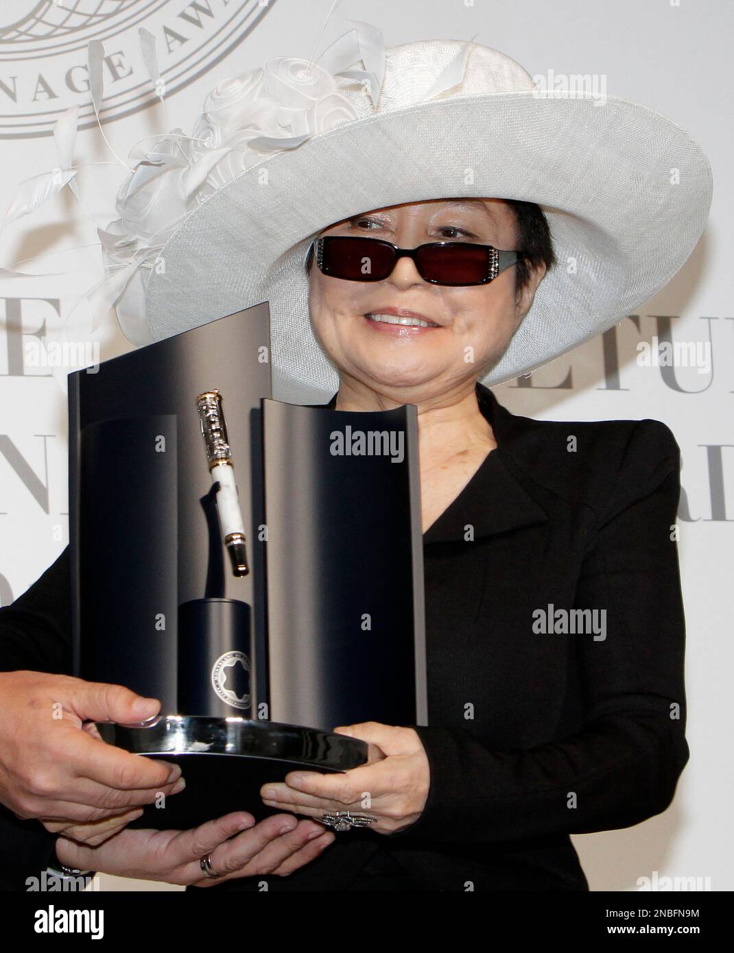 Yoko Ono receives the trophy of Montblanc de la Cuture Art Patronage ...