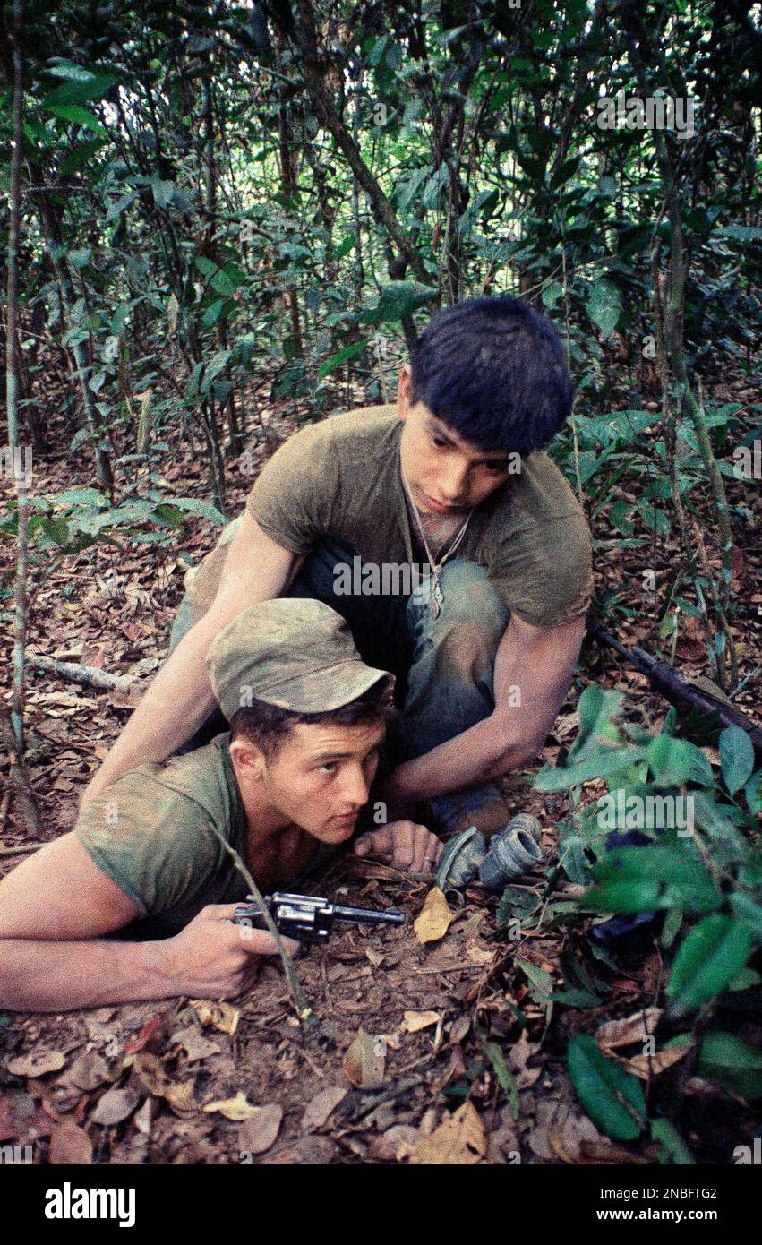 Tunnel rat Sgt. Ronald Payne of Atlanta, Ga., is helped from tunnel ...