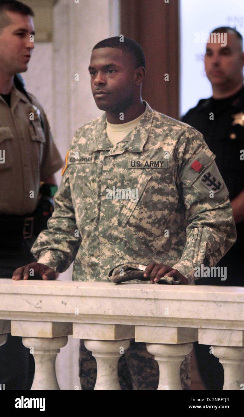 U.S. Army Pvt. Quinton Ezeagwula waits outside a courtroom at the ...
