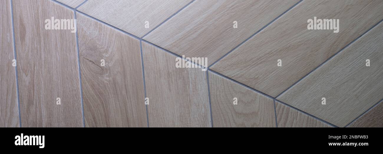 Oak texture of floor with tiles imitating parquet Stock Photo - Alamy
