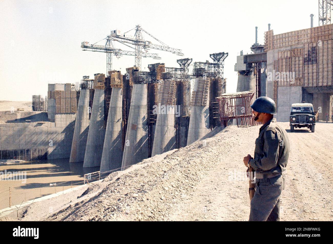 Armed guards patrol the newly-opened Euphrates Dam near Tabqa, Syria in ...