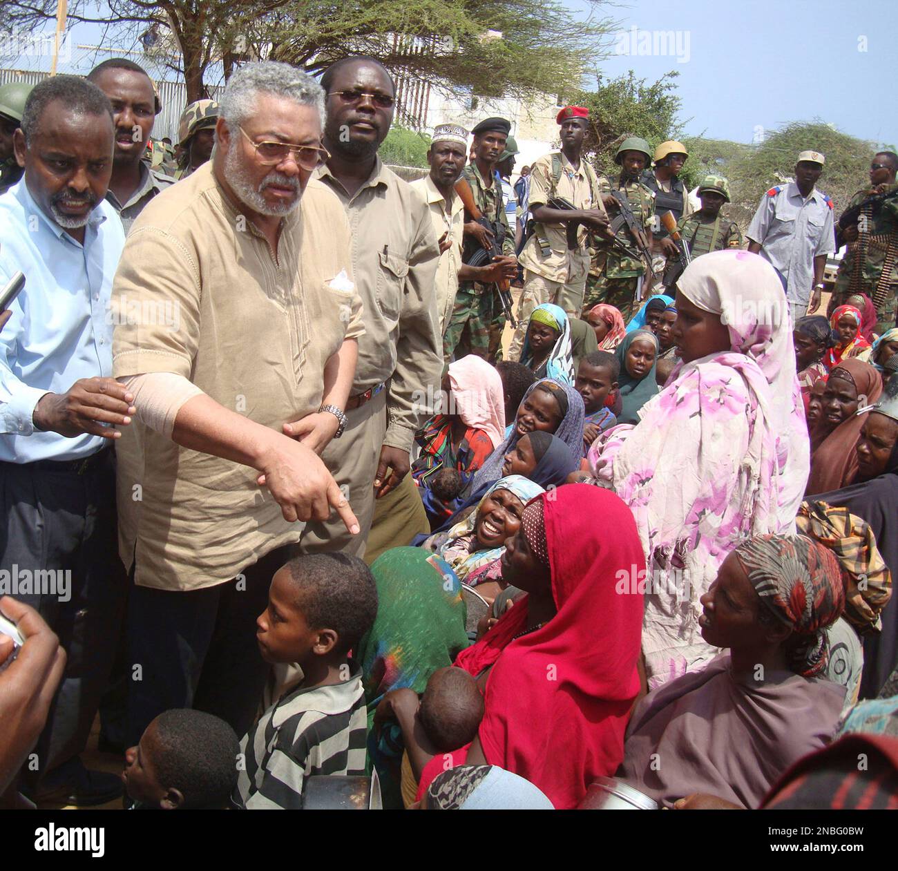 Jerry Rawlings, AU envoy to Somalia, gestures as he speaks to displaced ...