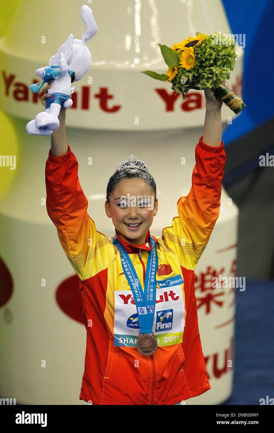 China's Sun Wenyan celebrates her bronze medal in the synchronised ...