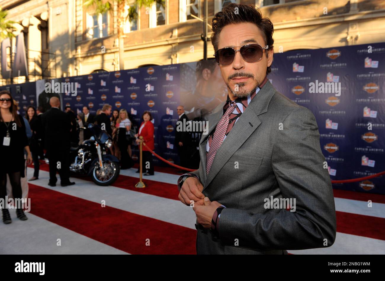Actor Robert Downey Jr. poses for photographers at the premiere of the ...