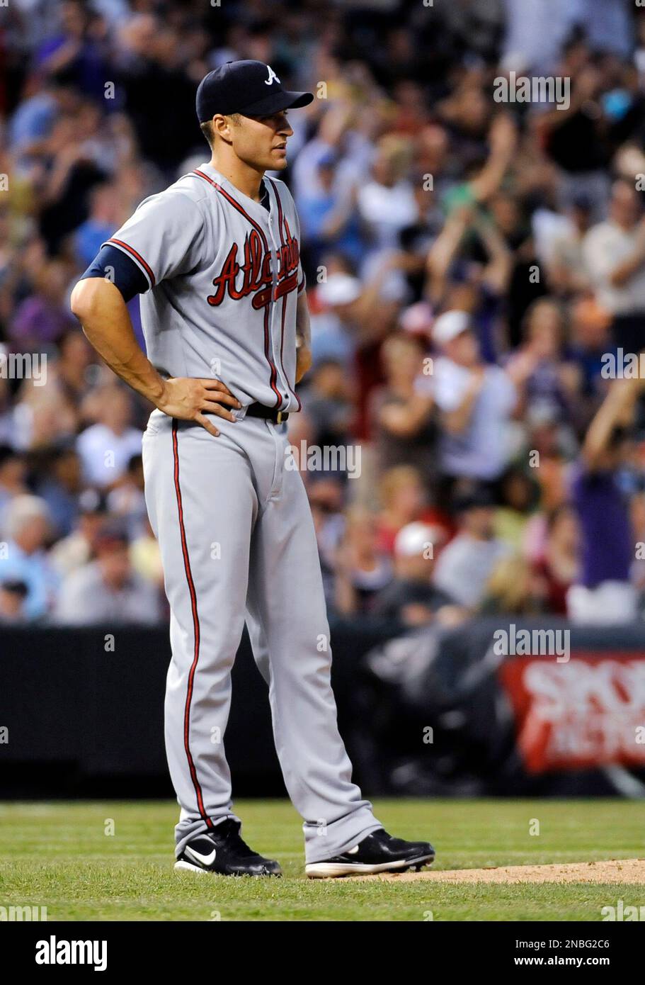 Atlanta Braves starting pitcher Brandon Beachy looks on after giving up ...