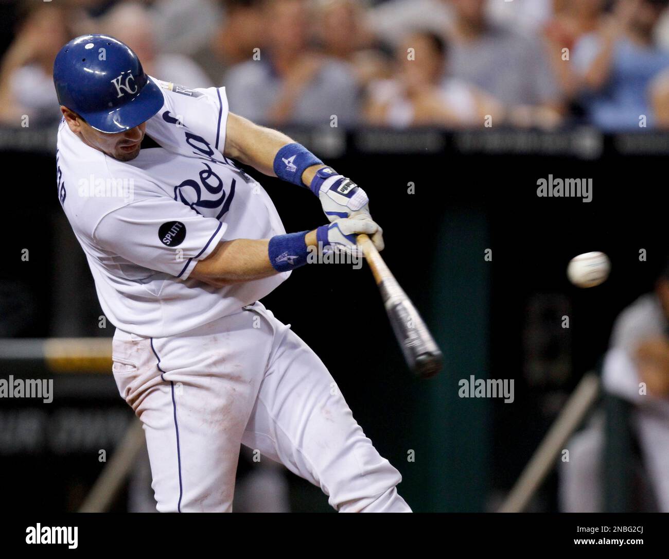 Kansas City Royals' Matt Treanor hits a two-run single in the sixth ...