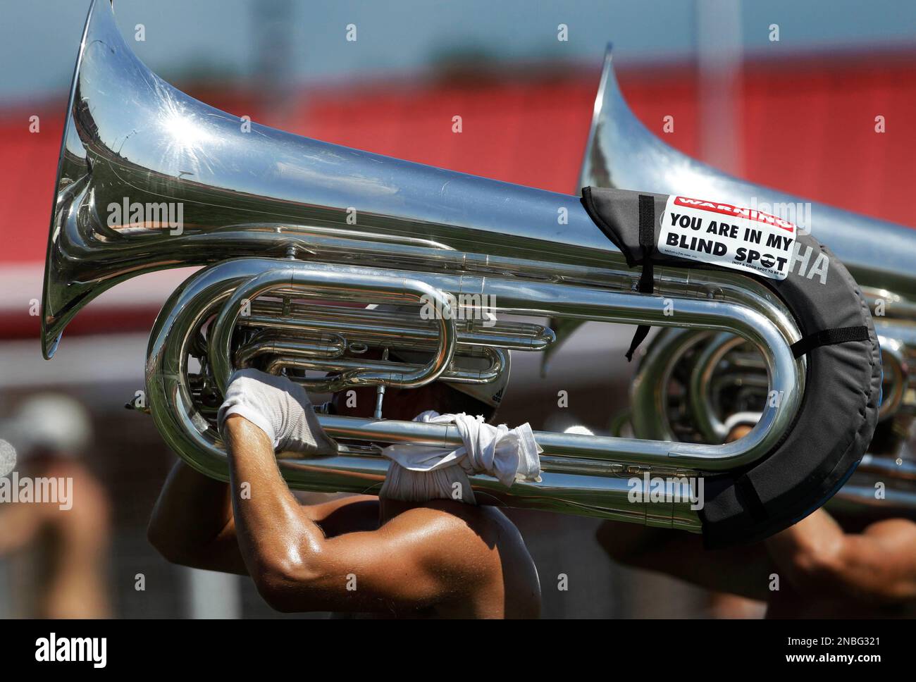 A contrabass player for "The Cadets Drum and Bugle Corps" practices at ...