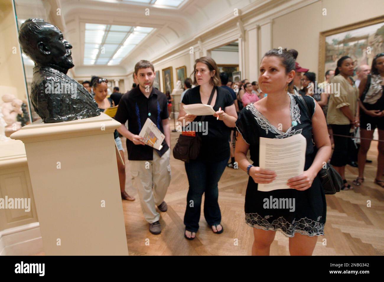 In this July 9, 2011 photo, Matthew Meche, left, Dana Zolli, center and ...
