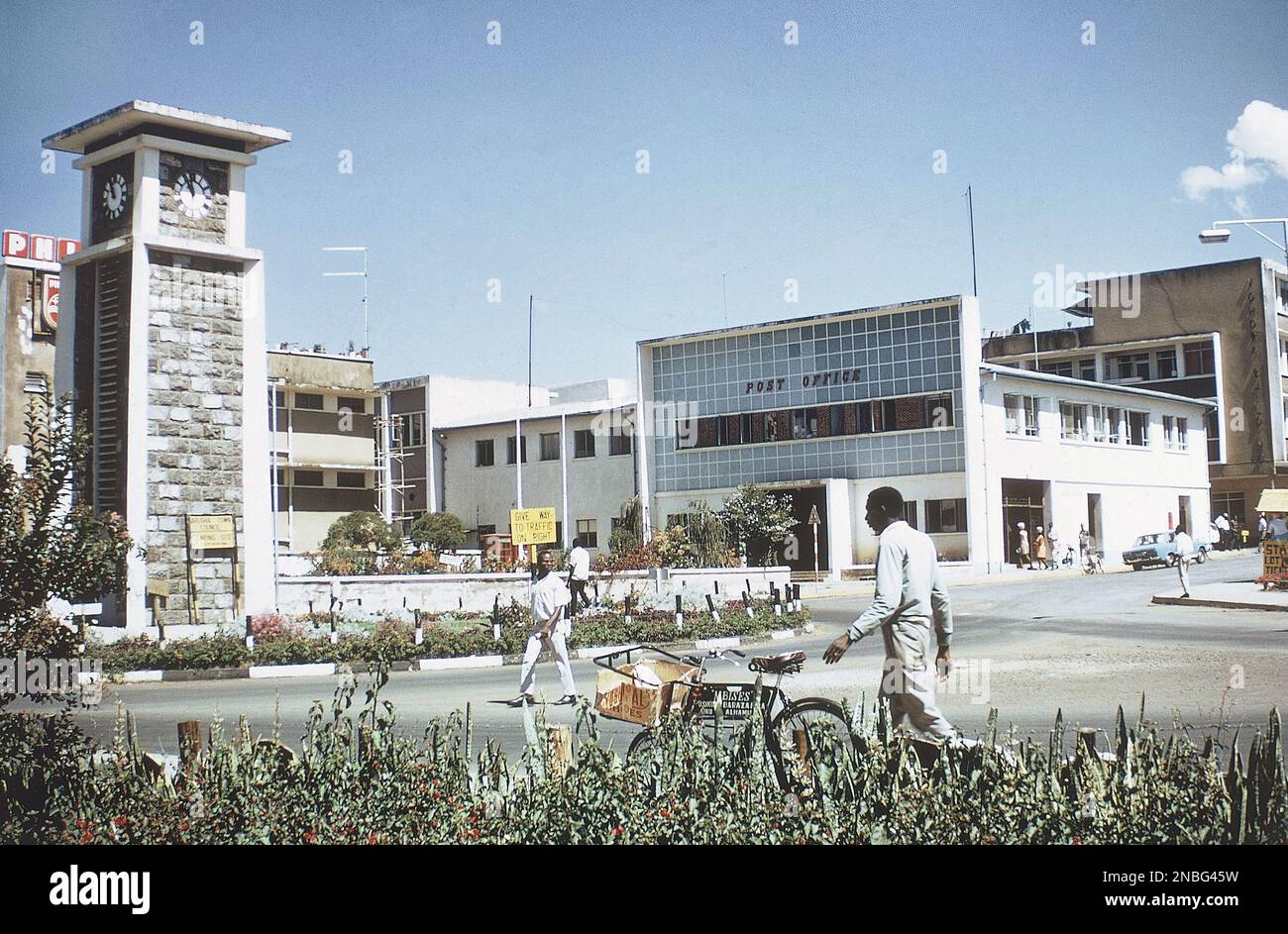 People and buildings in Arusha, Tanzania in 1971. (AP Photo Stock Photo ...