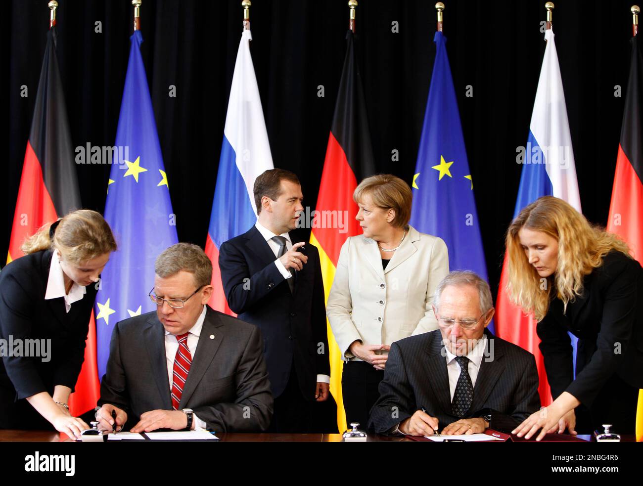 German Chancellor Angela Merkel, 3rd right, and Russian President ...