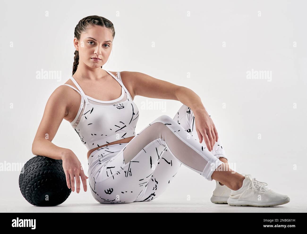 Classy, sassy and a little bad assy. Studio portrait of a sporty young ...
