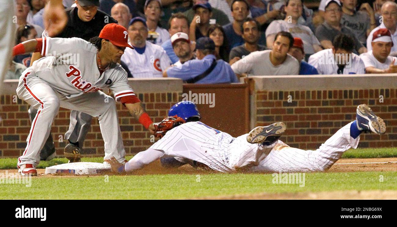 Philadelphia Phillies center fielder Michael Martinez, left, catches ...