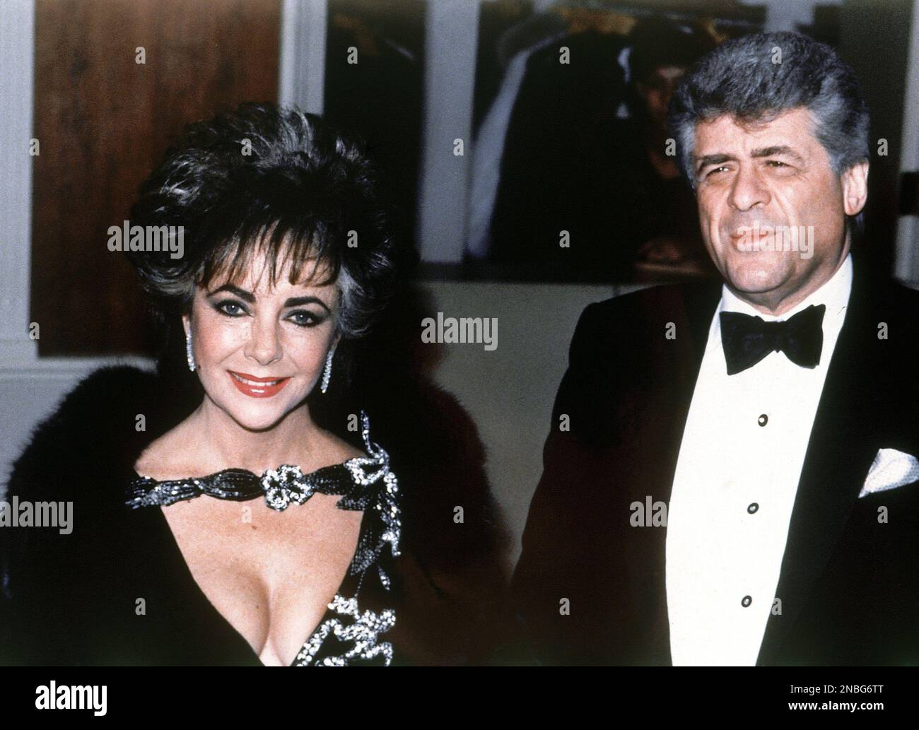 British-born American actress Elizabeth Taylor, accompanied by her ...