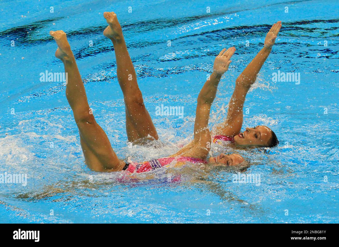 Canada's Elise Marcotte and Mari-Pier Boudreau-Gagnon perform their ...