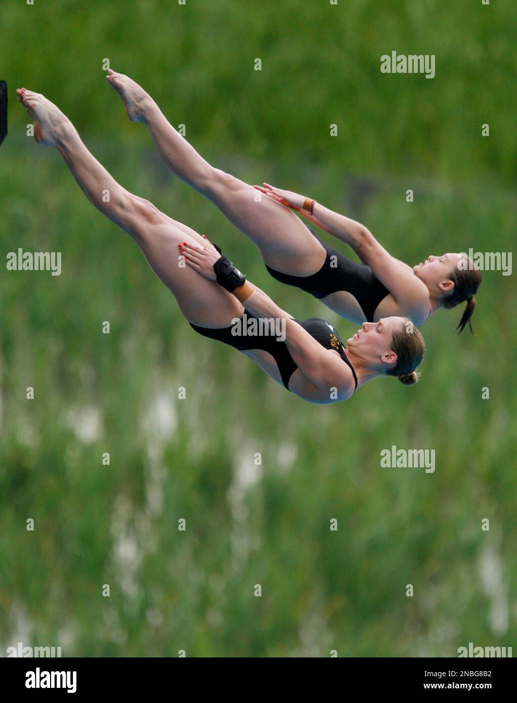 Australia's Alexandra Croak and Melissa Wu dive during the women's 10 ...