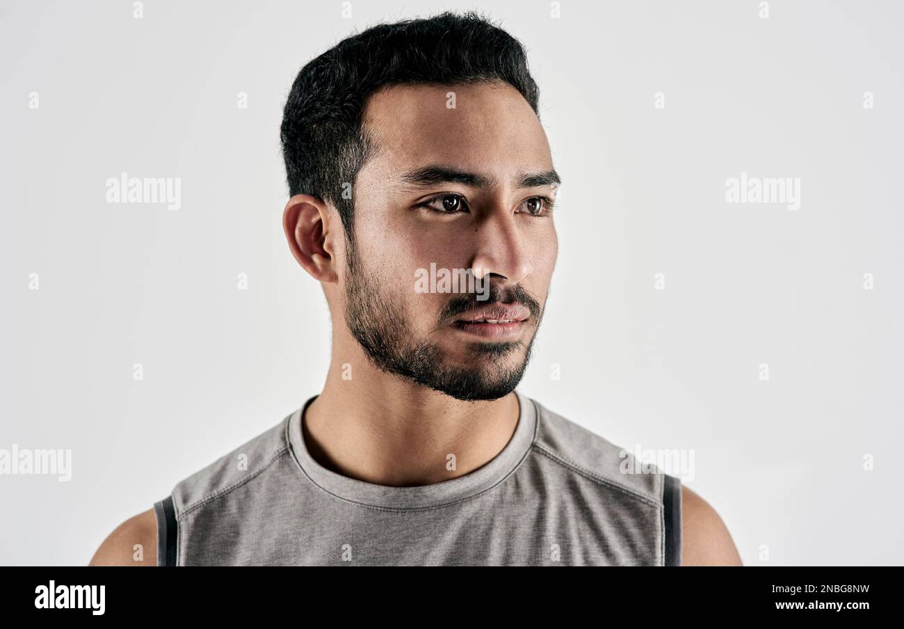 Physically and mentally indestructible. Studio shot of a sporty young ...