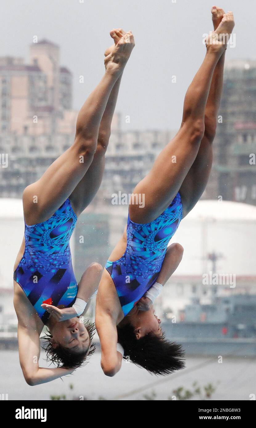 Wang Hao and Ruolin Chen of China dive during the women's 10-meter ...
