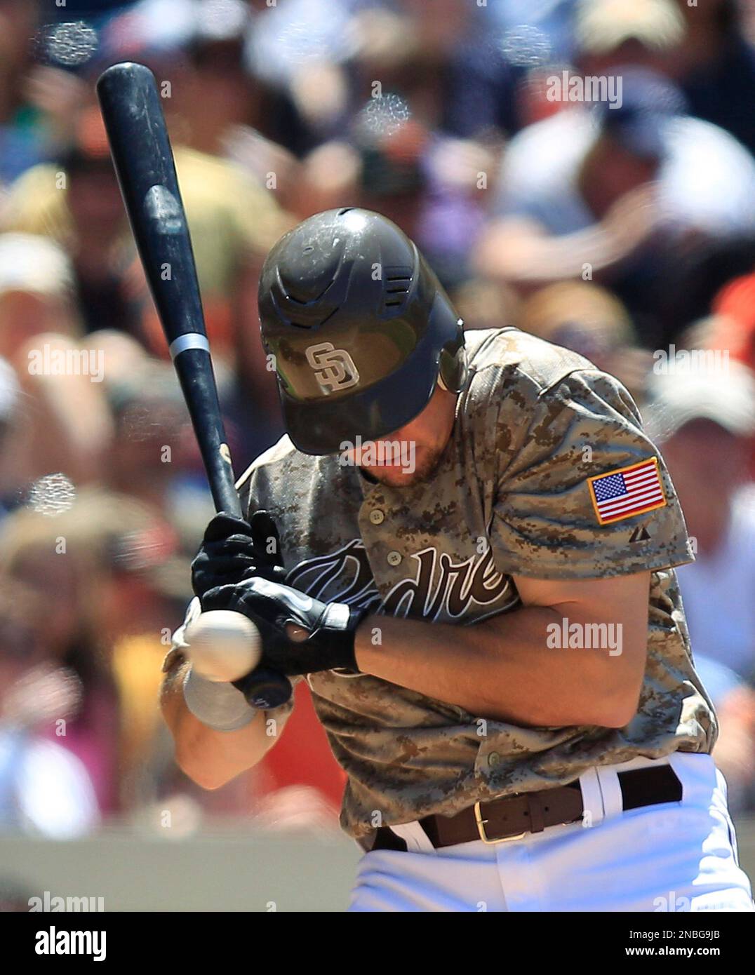 San Diego Padres' Ryan Ludwick is hit in the hand by a pitch from San ...