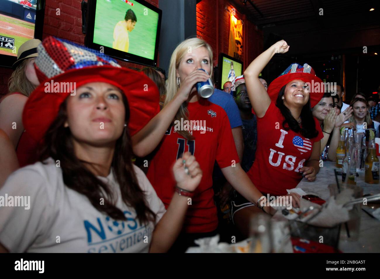 Sam Penico, left, Leigh Ann Renfro, and Lauren Rachal, right, react as ...
