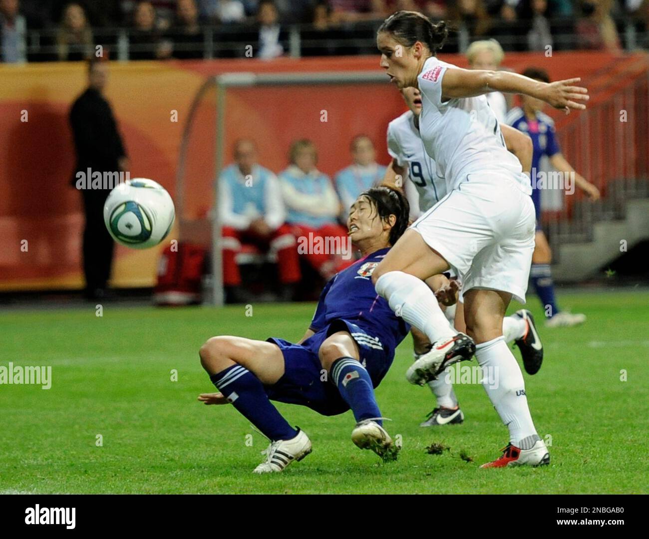 United States' Alex Krieger, right, vies for the ball with Japan's ...