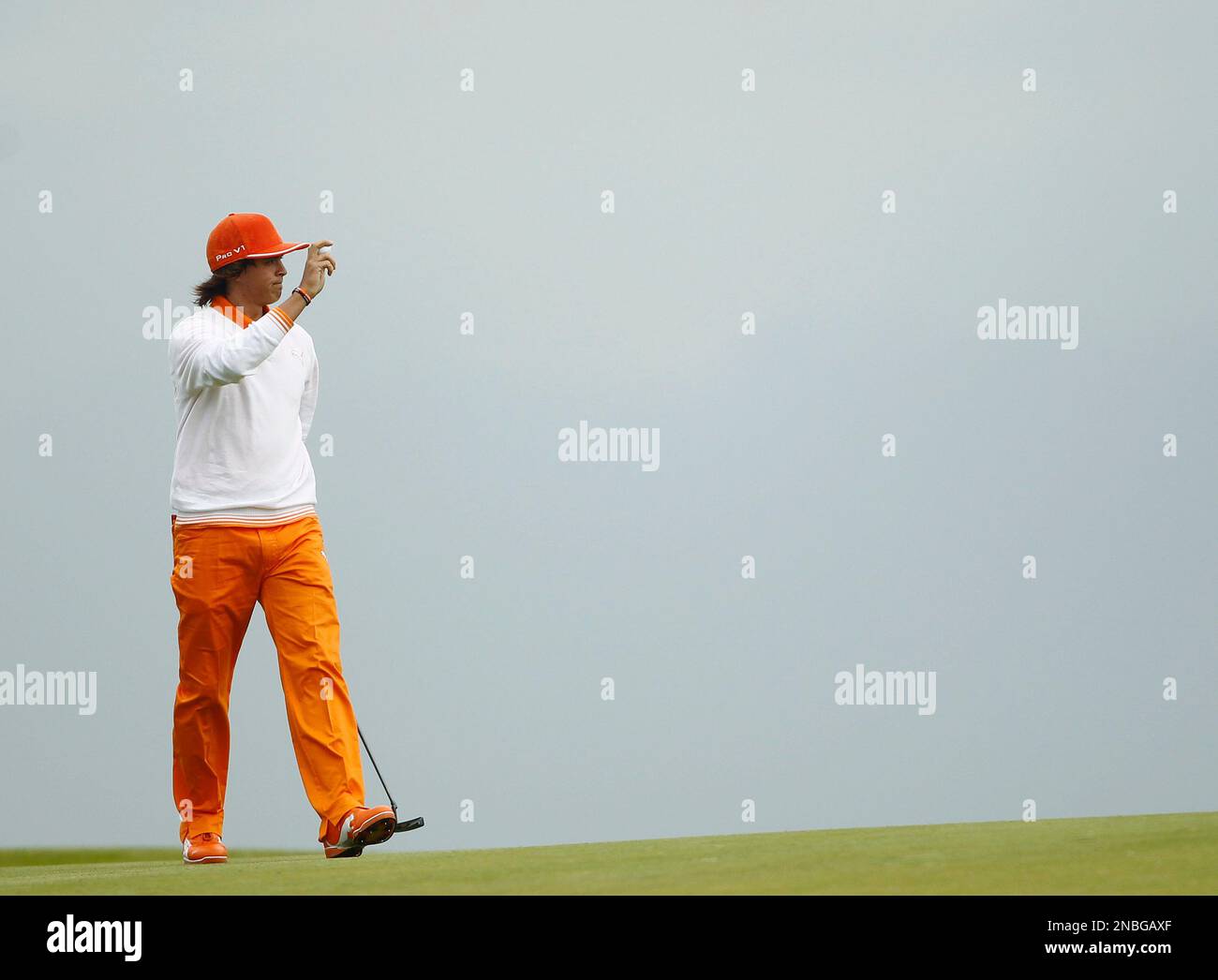 Rickie Fowler of the U.S. reacts after putting on the 10th green during ...