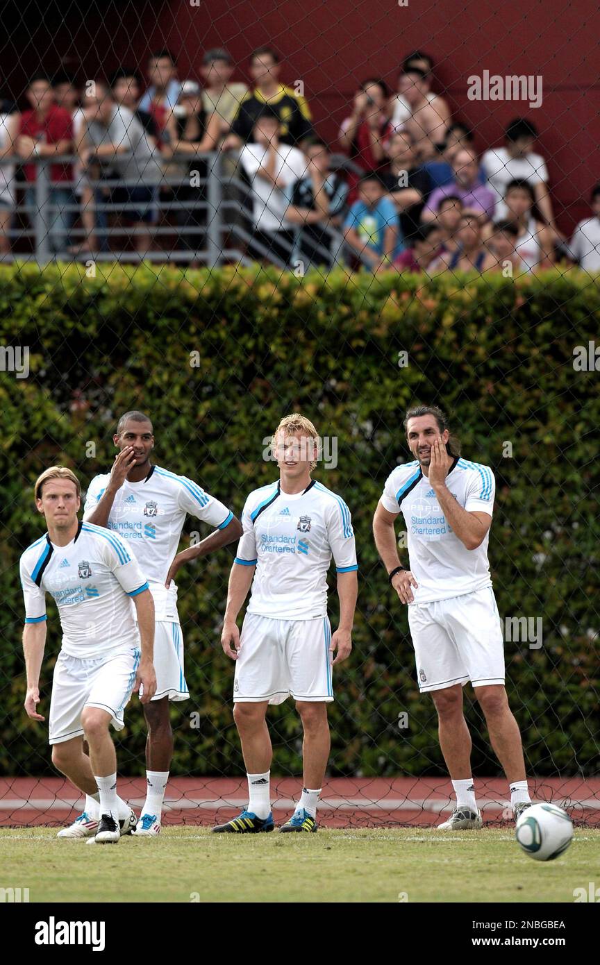 Liverpool players, from left, Christian Poulson, David N'gog, Dirk Kuyt ...