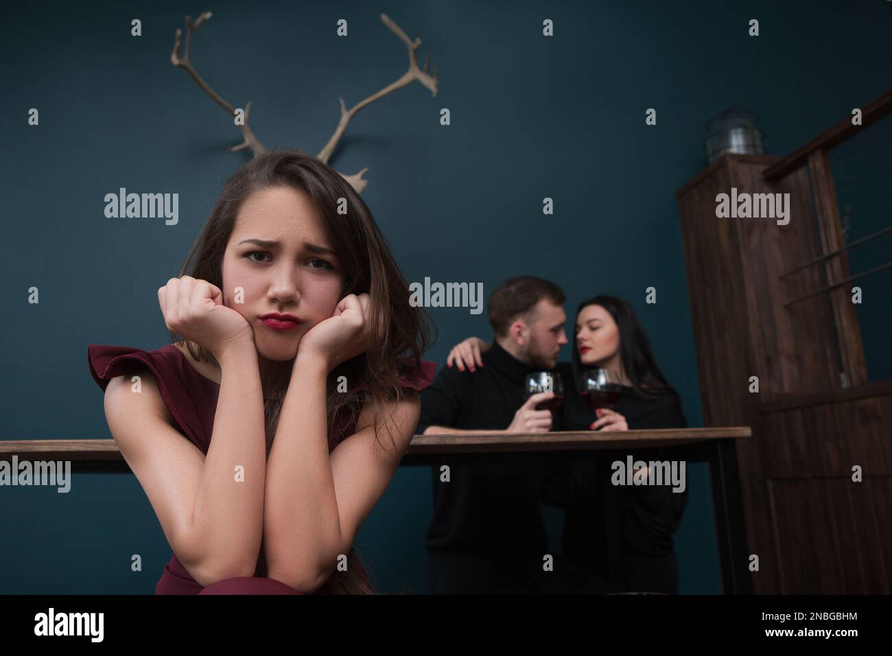 Cheating relationships. Unhappy betrayed girl Stock Photo - Alamy