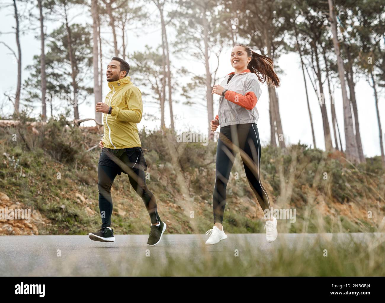 We push each other to do our best. Full length shot of two young ...