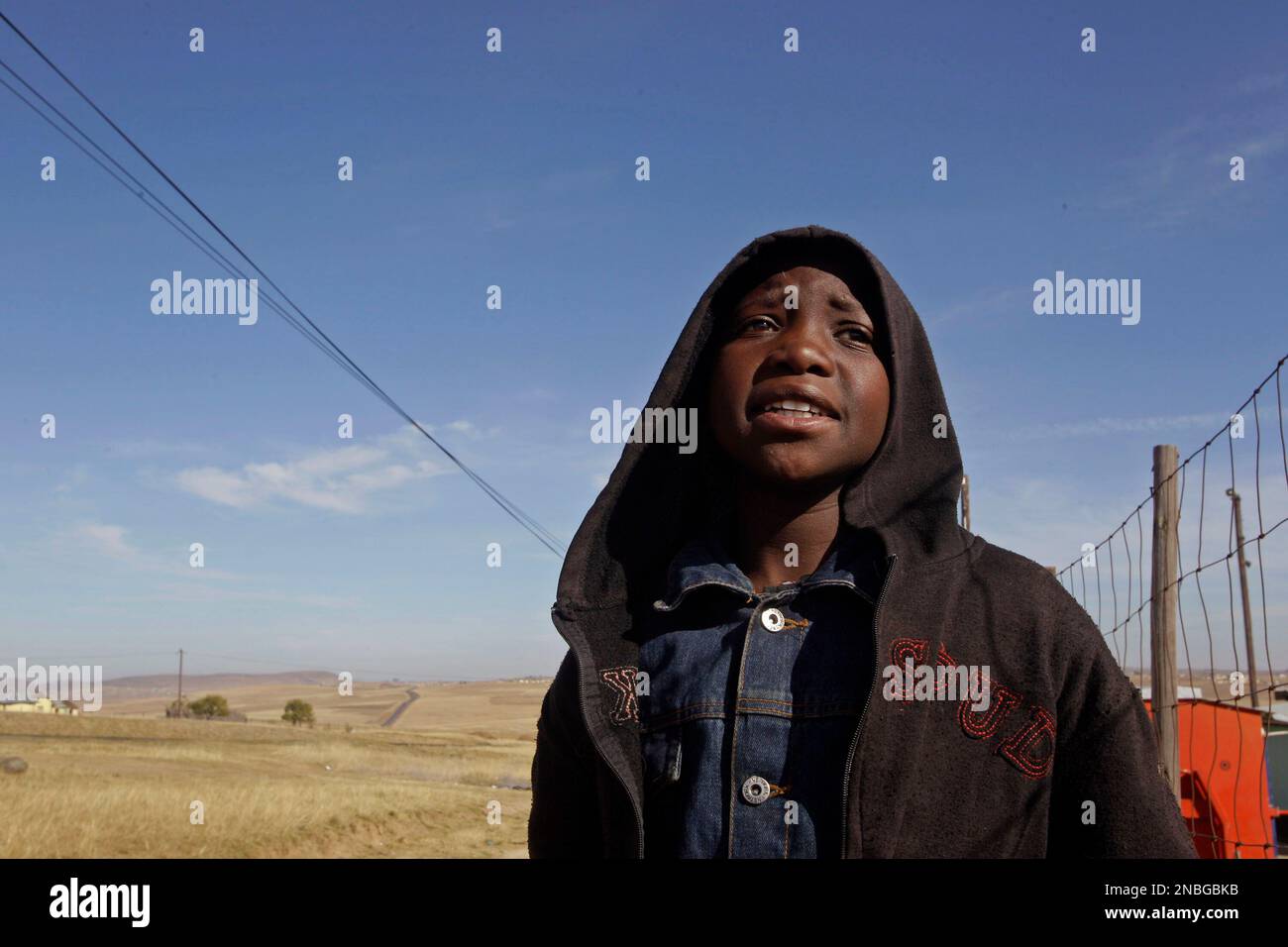 Andy Mandela reacts as his parents call him home, were they live across ...