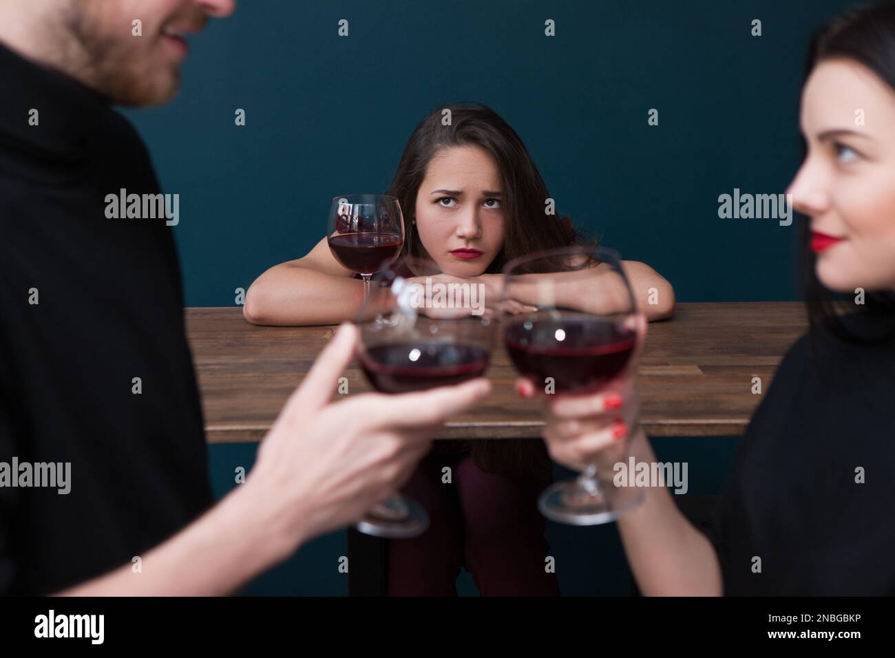 Jealous friend in bar hi-res stock photography and images - Alamy