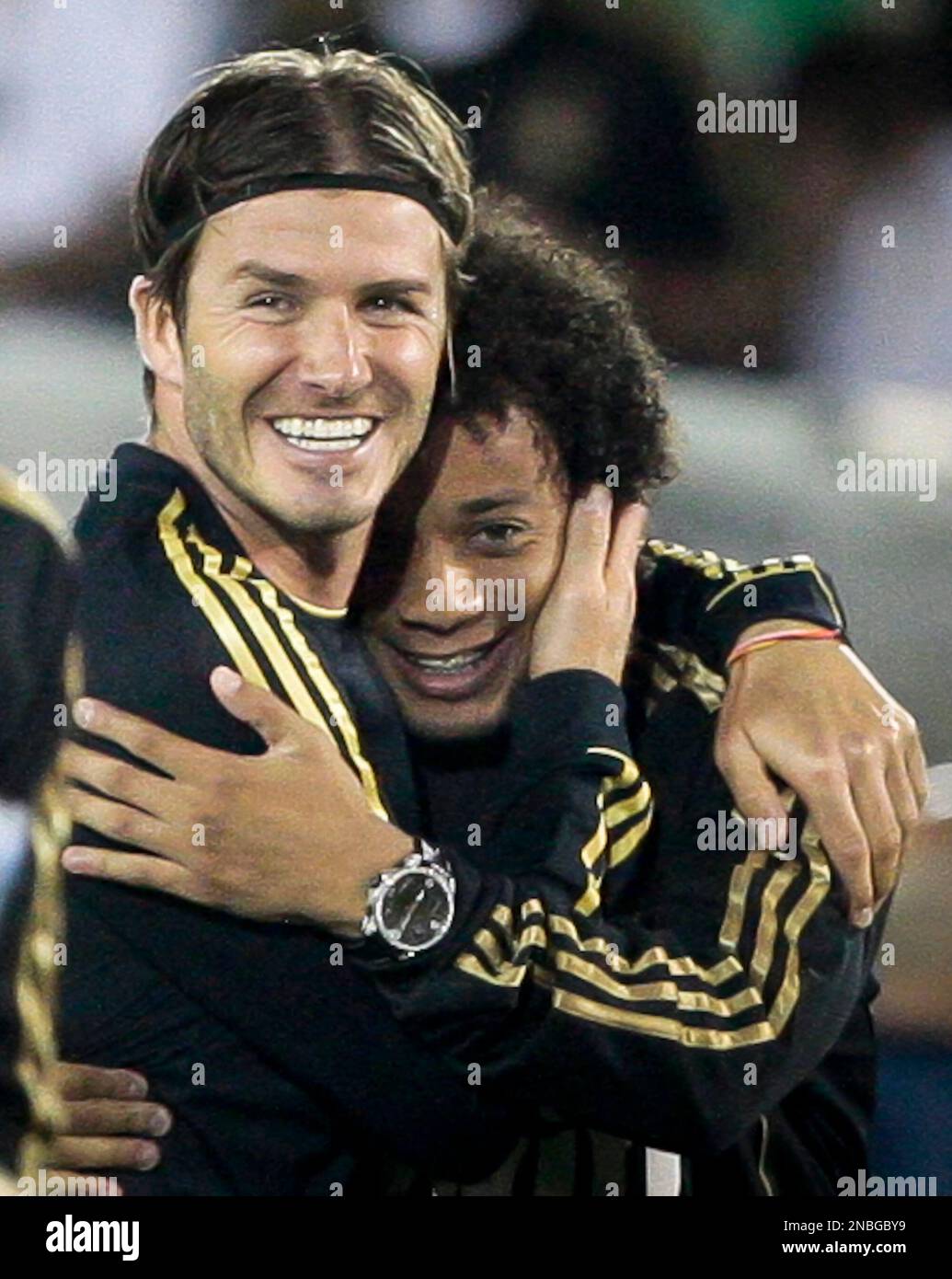 Los Angeles Galaxy's David Beckham, left, hugs Real Madrid's Marcelo ...