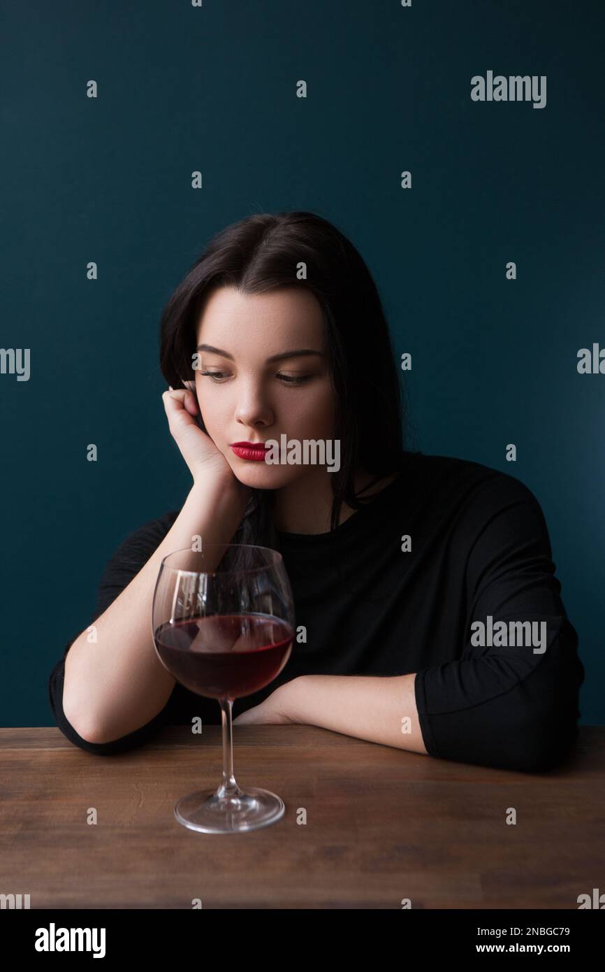 Lonely female in bar. Melancholic mood Stock Photo - Alamy