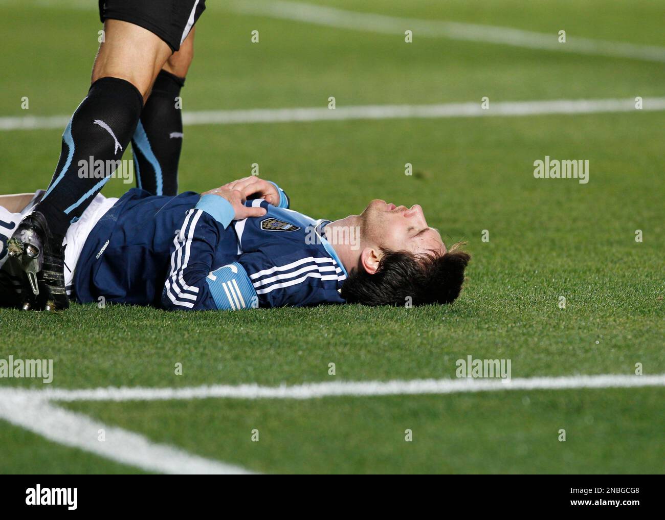 Argentina's Lionel Messi lies on the field during a Copa America ...