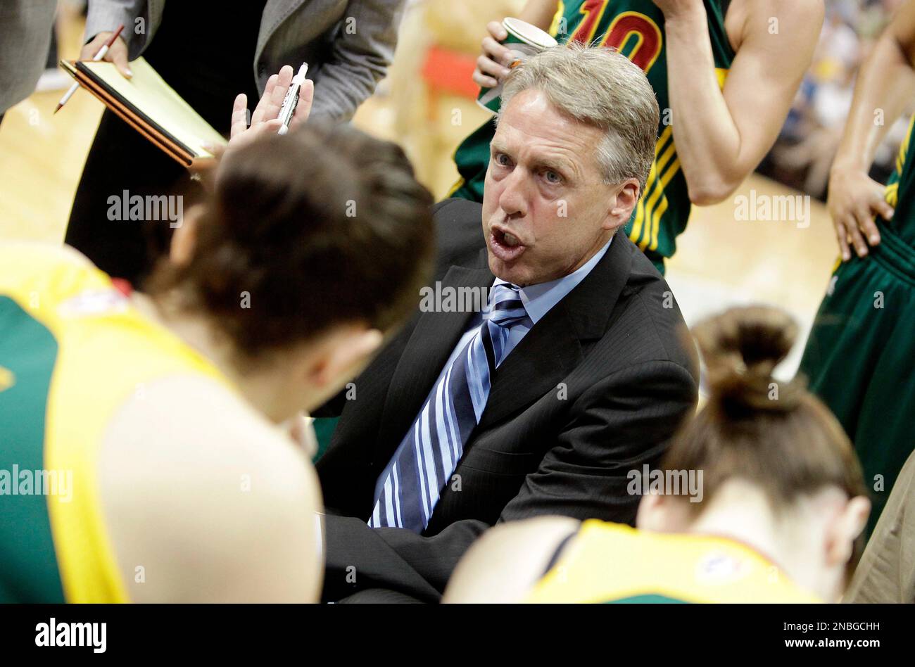 Seattle Storm head coach Brian Agler talks with his team during a ...