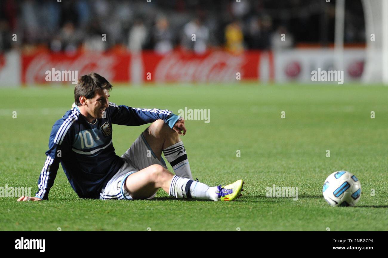 Argentina's Lionel Messi reacts after being fouled during a ...