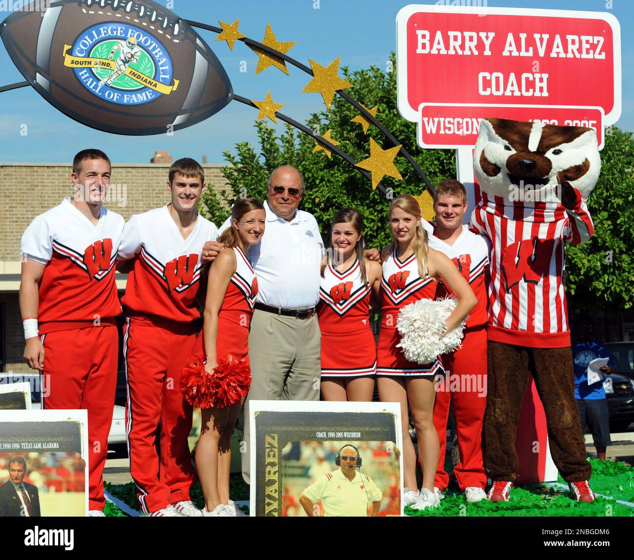 Barry Alvarez, center, Wisconsin coach 1990-2005, poses for a photo ...