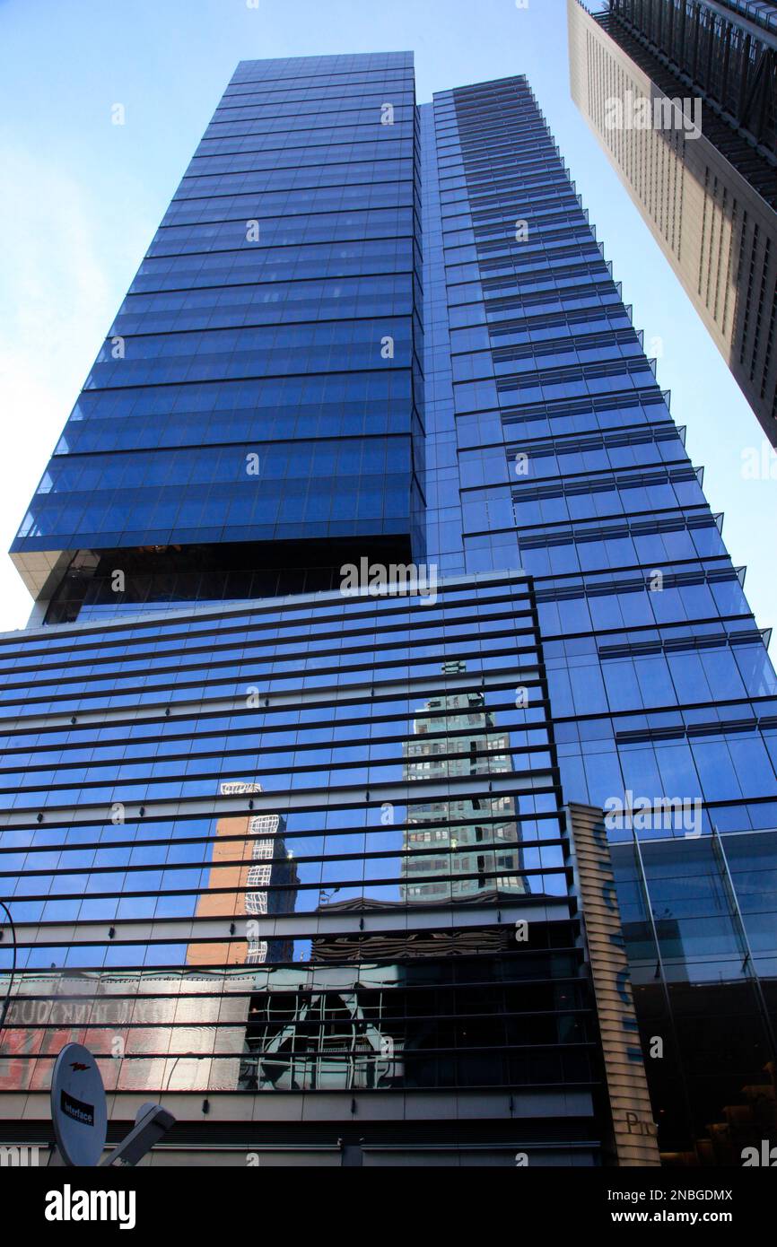 Times Square Plaza, also known as 11 Times Square, towers over 8th Ave ...