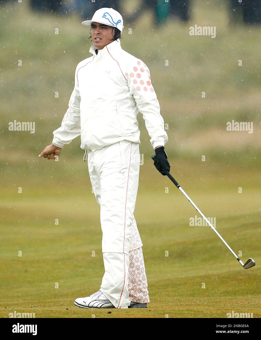 Rickie Fowler of the U.S. watches his shot down the 8th fairway during ...