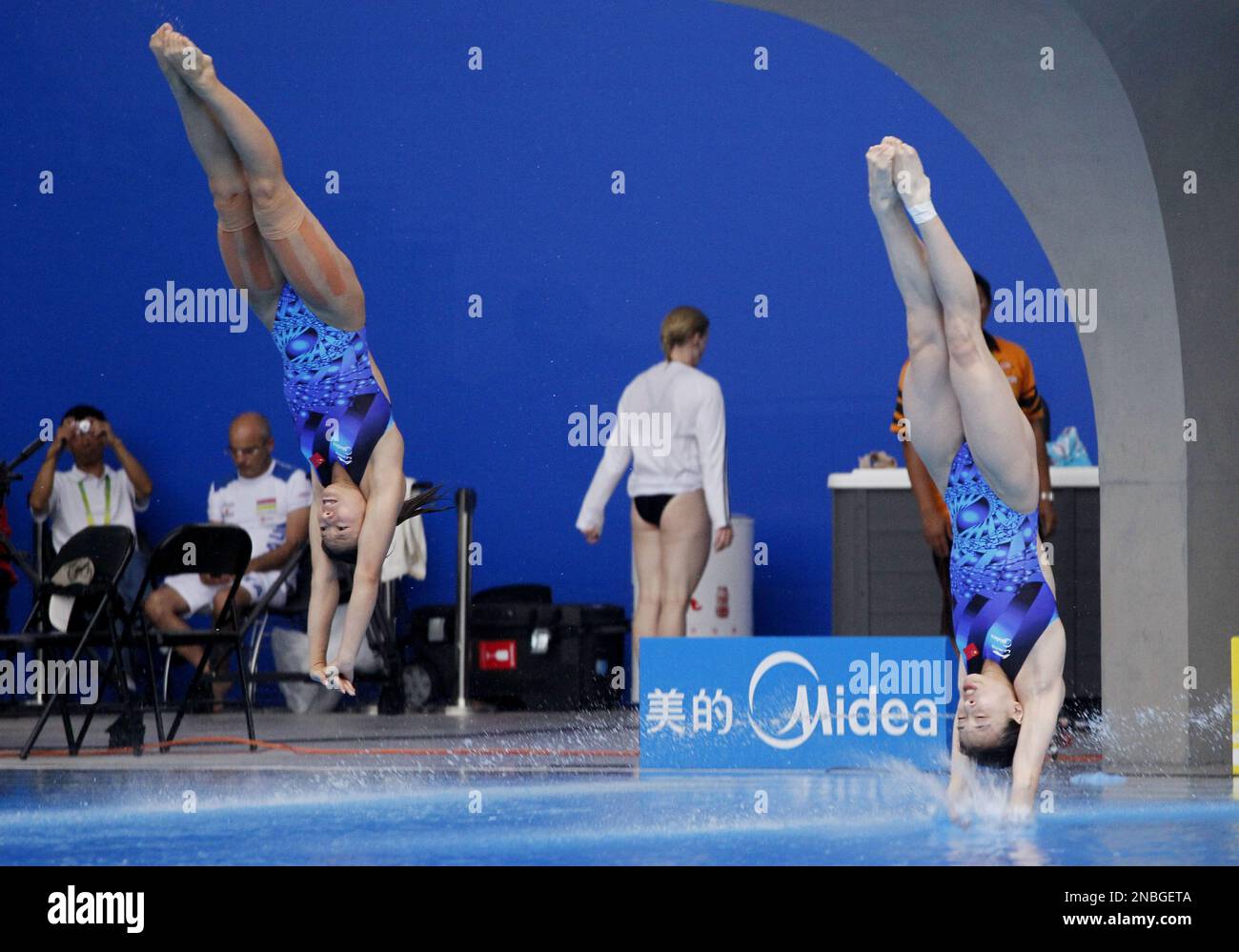 China's Wu Minxia and He Zi dive during the women's 3m Synchro ...