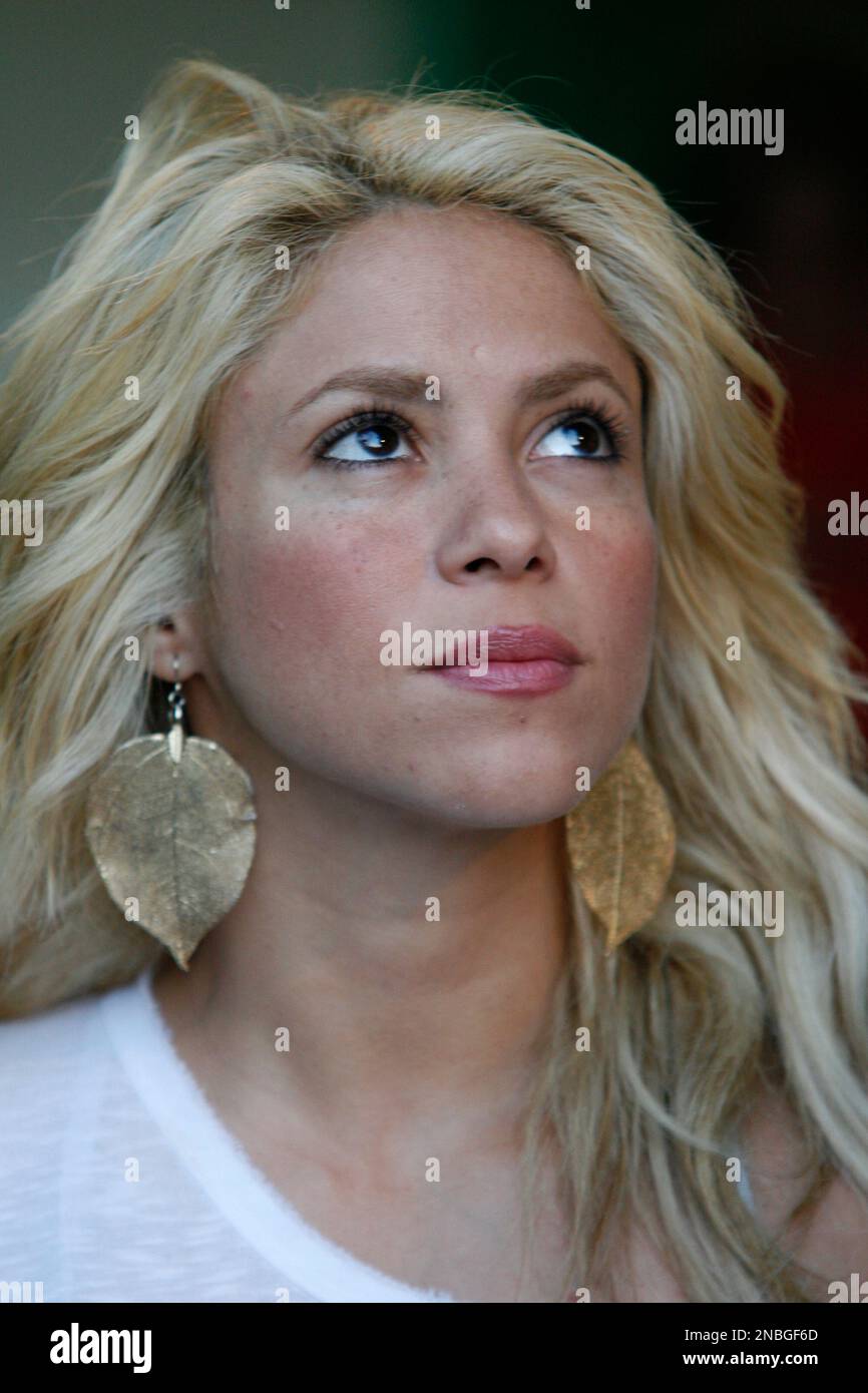 Colombia's pop singer Shakira looks up during an event of her 'Alas ...