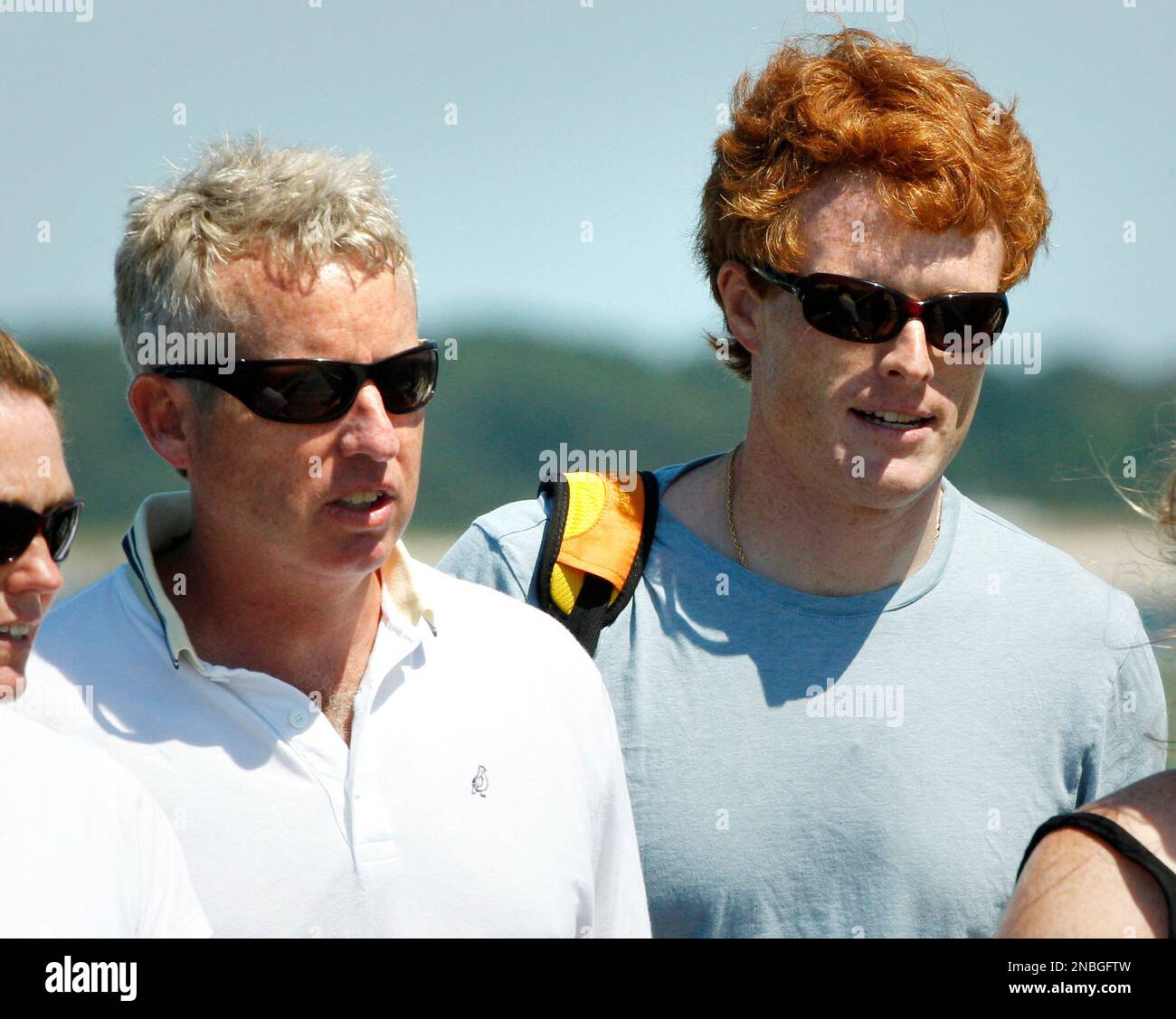 Joseph Kennedy III, right, walks with his uncle Chris Kennedy, left ...