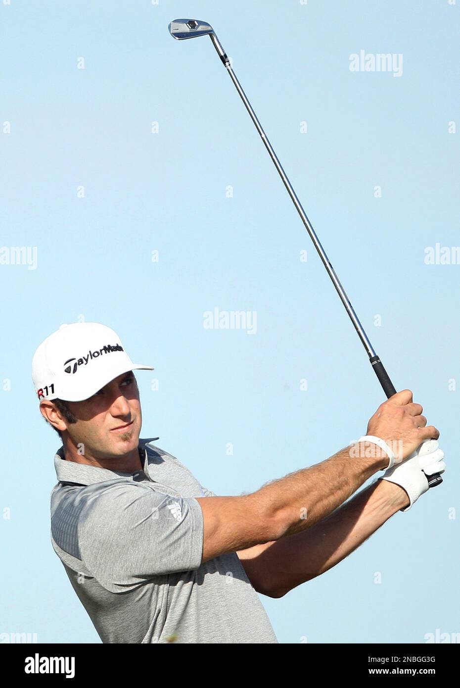 Dustin Johnson of the US plays a shot off the 16th tee during the ...