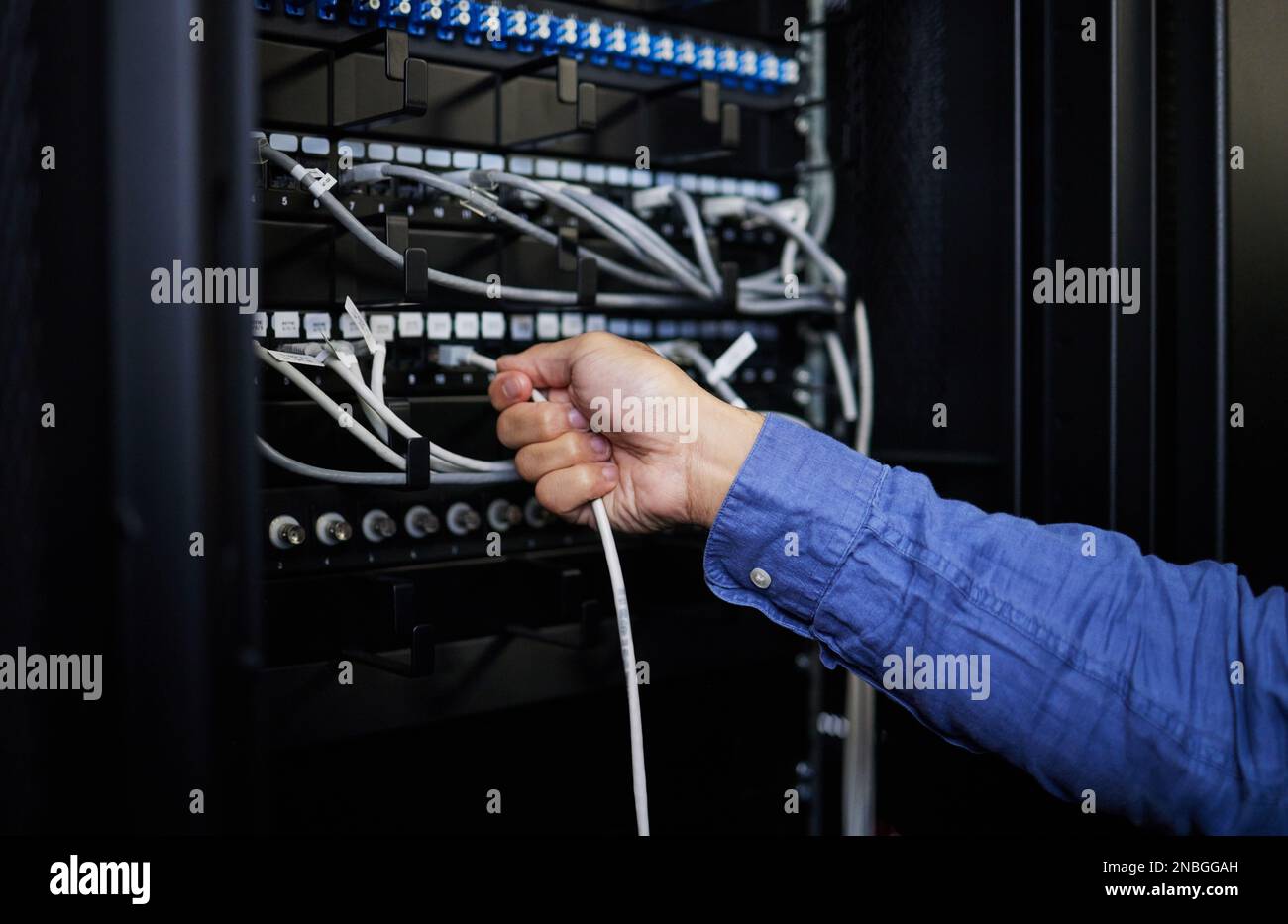 Engineer hands, server room and cable connection for software update or ...