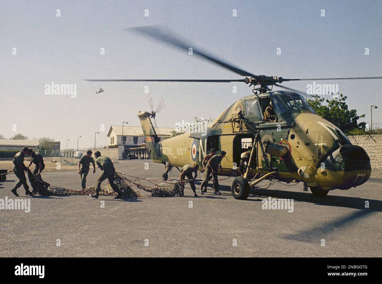 Men of 42 Royal Marine Commando airlift men and their baggage from the ...