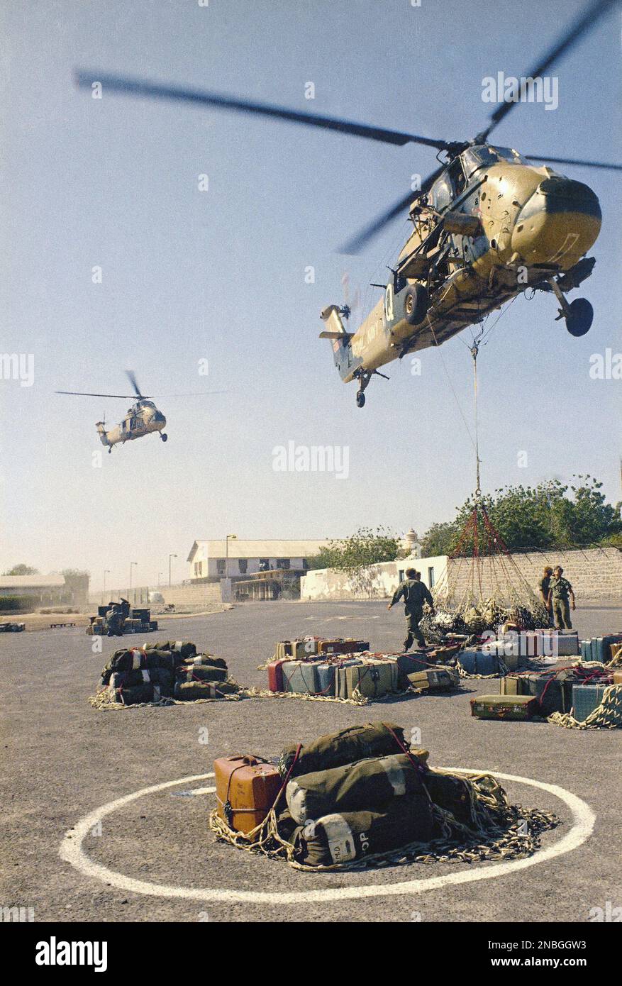 Men of 42 Royal Marine Commando airlift men and their baggage from the ...