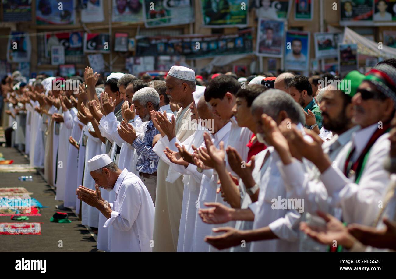 Libyans pray during friday prayers in rebel-held Benghazi, Libya ...