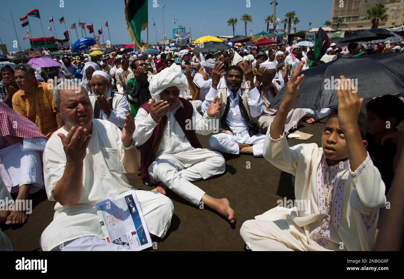 Libyans pray during Friday prayers in rebel-held Benghazi, Libya ...