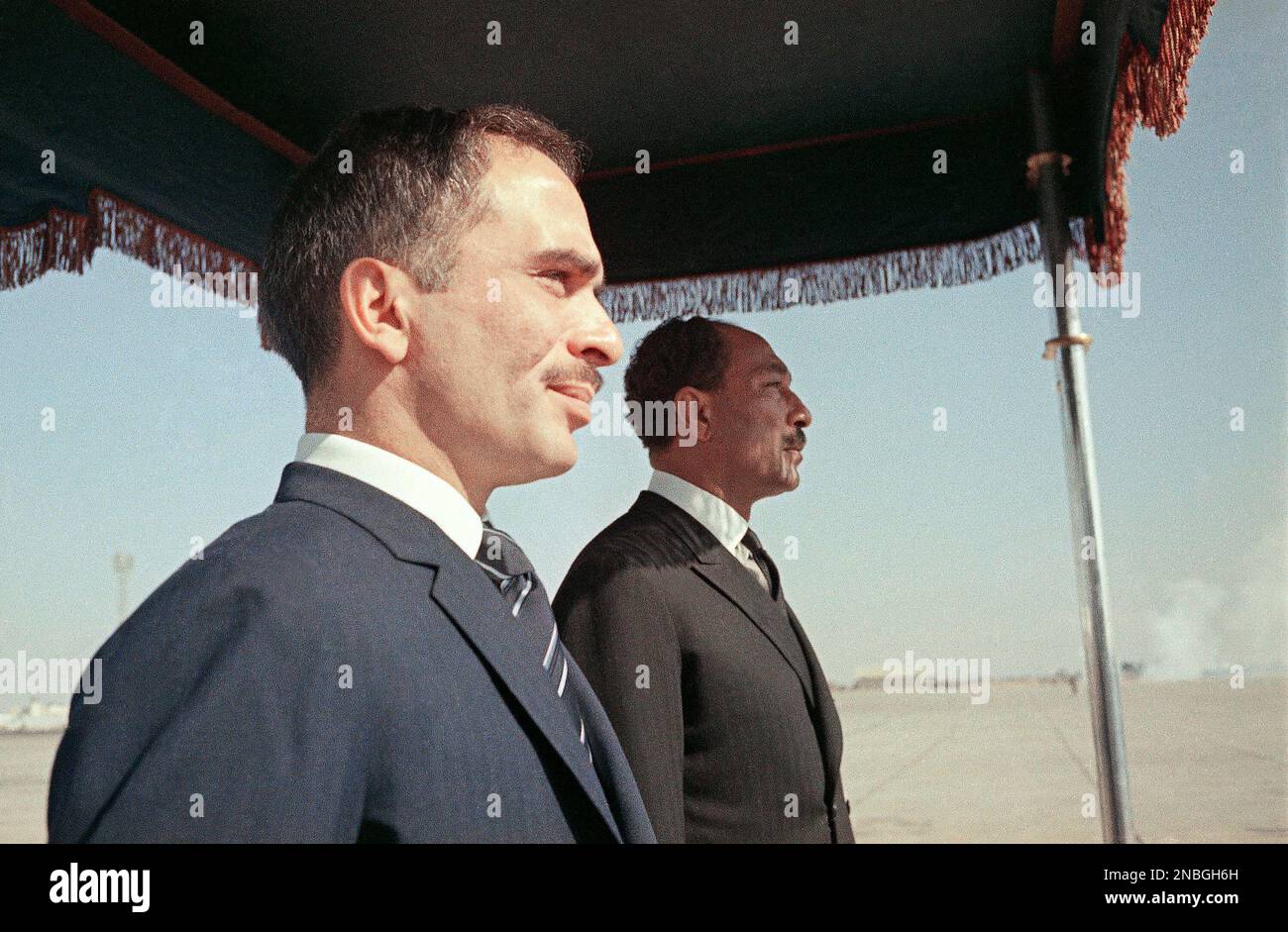 Egyptian President Anwar El Sadat, right, is greeting King Hussein of ...